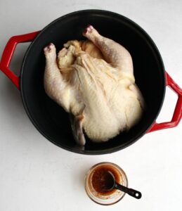 How to Roast a Chicken in a Dutch Oven - Cooking With Carlee