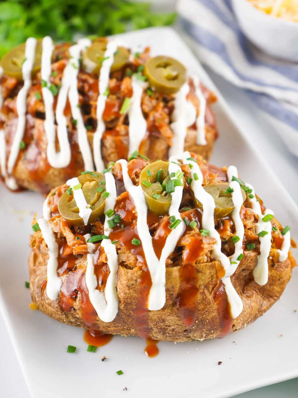 Pulled Pork Stuffed Baked Potatoes - Cooking With Carlee