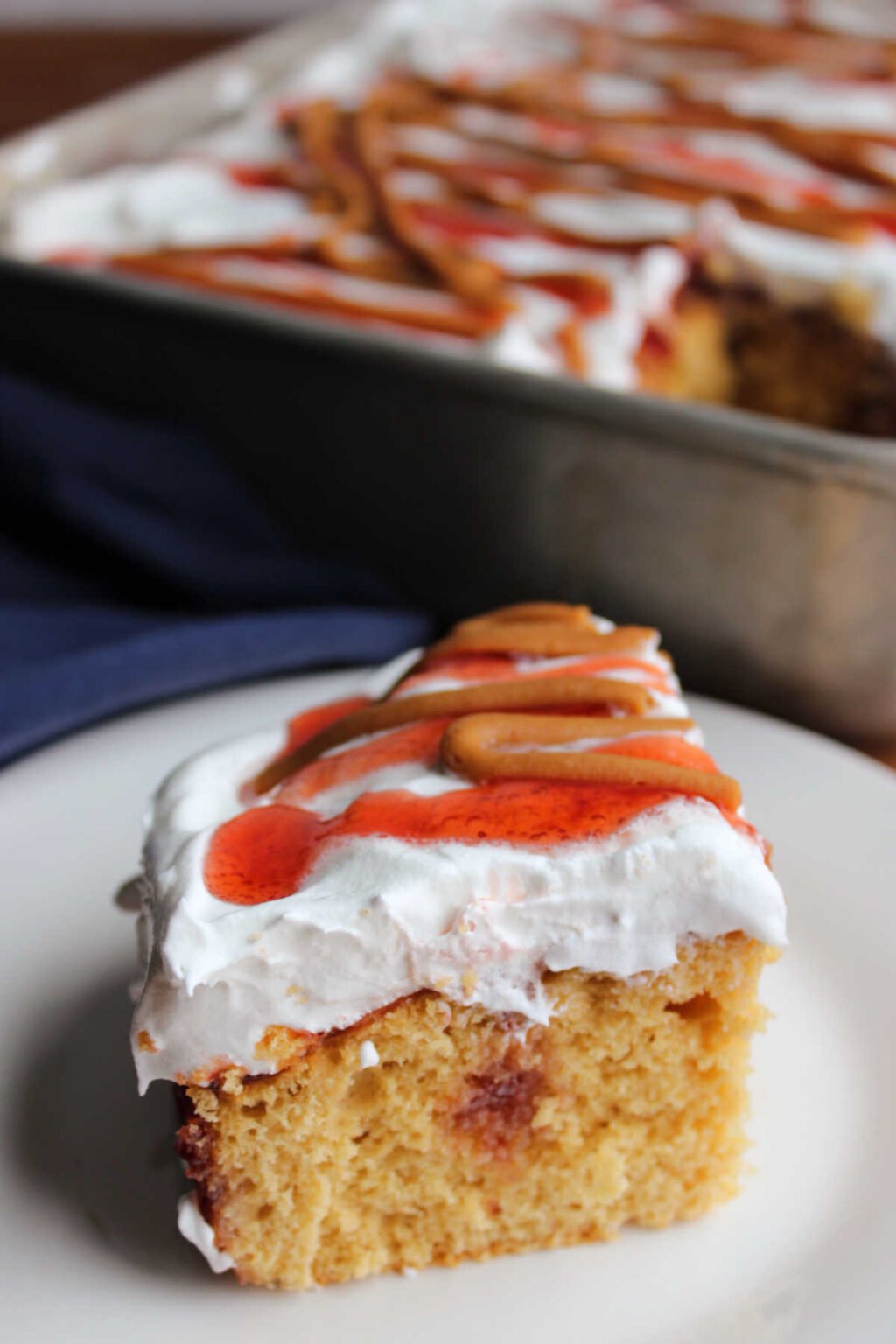 Peanut Butter and Jelly Poke Cake - Cooking With Carlee
